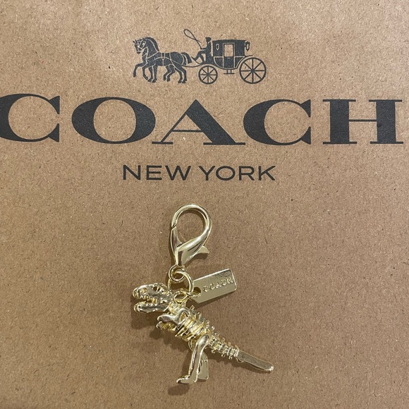 Coach | Accessories | Coach Metallic Gold Dinosaur Charm | Poshmark
